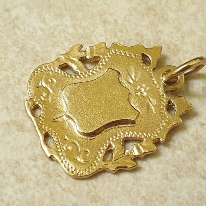 Ornate Shield Medallion in 9ct Gold. - Gems Afire - Vintage Jewellery UK
