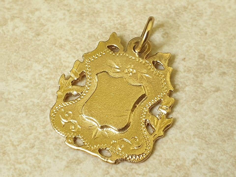 Ornate Shield Medallion in 9ct Gold. - Gems Afire - Vintage Jewellery UK