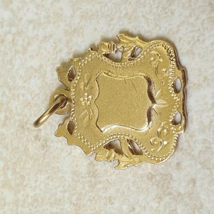 Ornate Shield Medallion in 9ct Gold. - Gems Afire - Vintage Jewellery UK