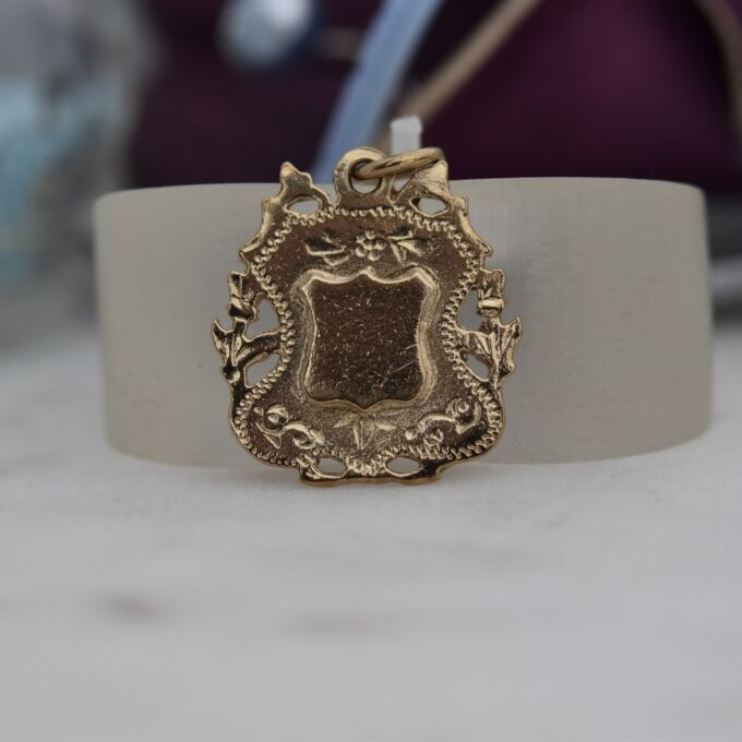 Ornate Shield Medallion in 9ct Gold. - Gems Afire - Vintage Jewellery UK
